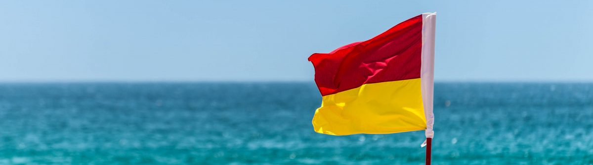 Was bedeuten die Flaggen am Strand? | Urlaubsguru